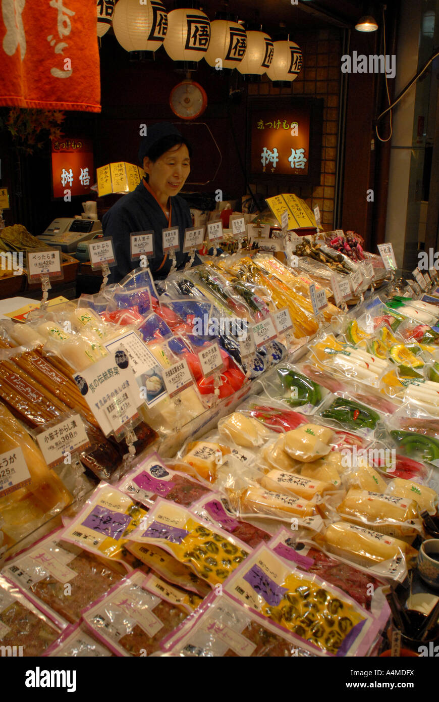 Market stall selling traditional foods in Kyoto Japan Stock Photo - Alamy