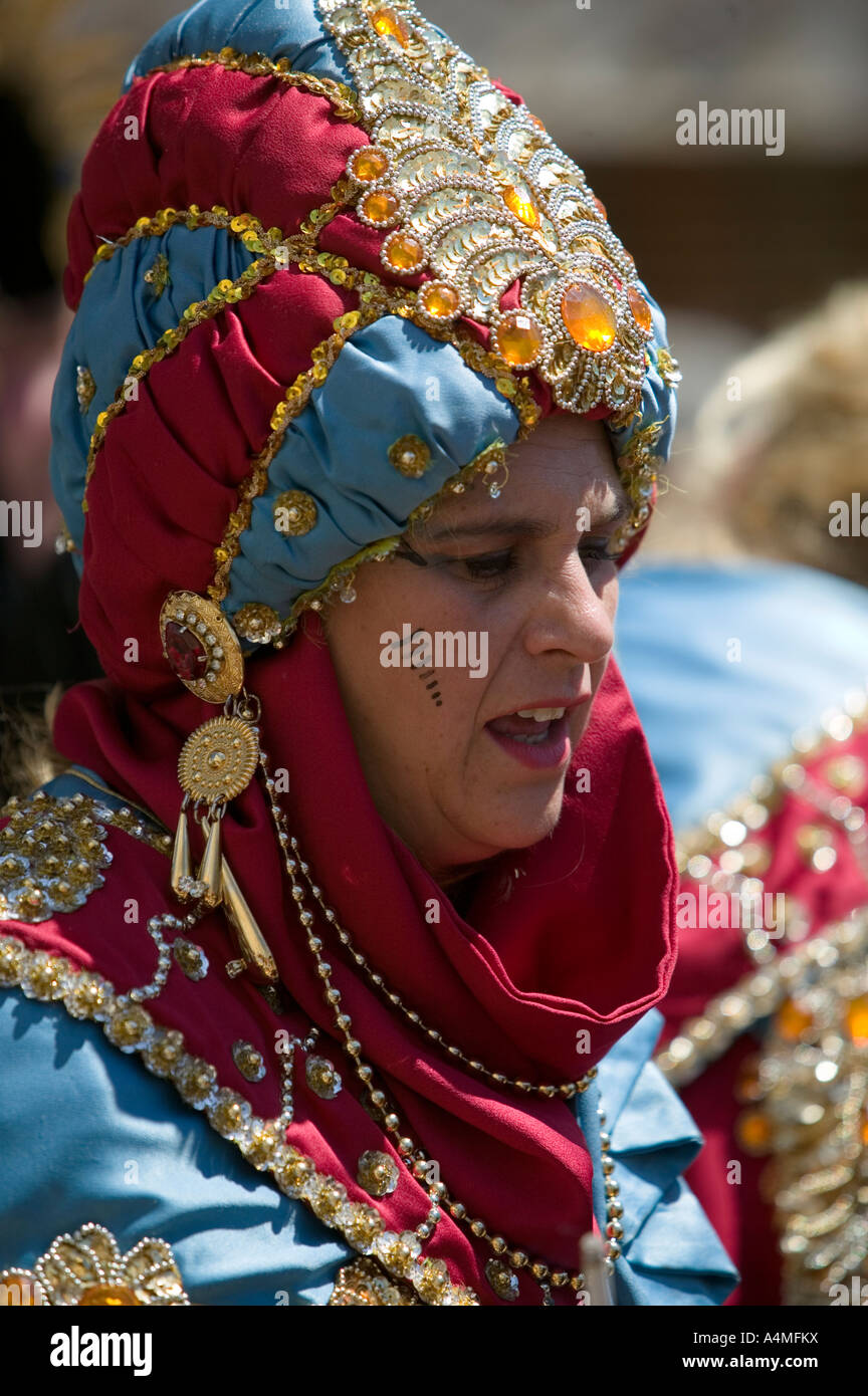 Woman wearing ornate Arabian style headdress during Fiesta de la Virgen ...