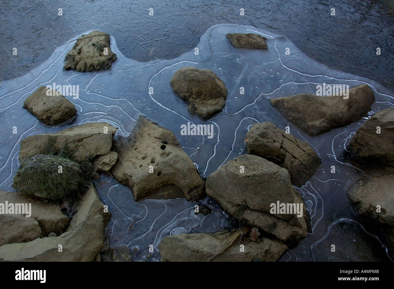 Rocks and Ice pattern in winter.Conwy North Wales Stock Photo - Alamy