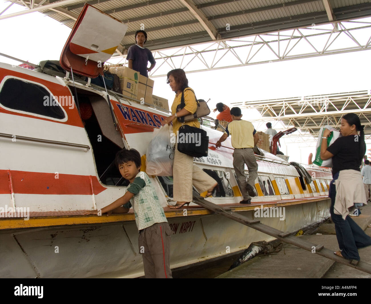 Malaysia Sarawak Sibu Rejang River waterfront boarding boat in ferry ...