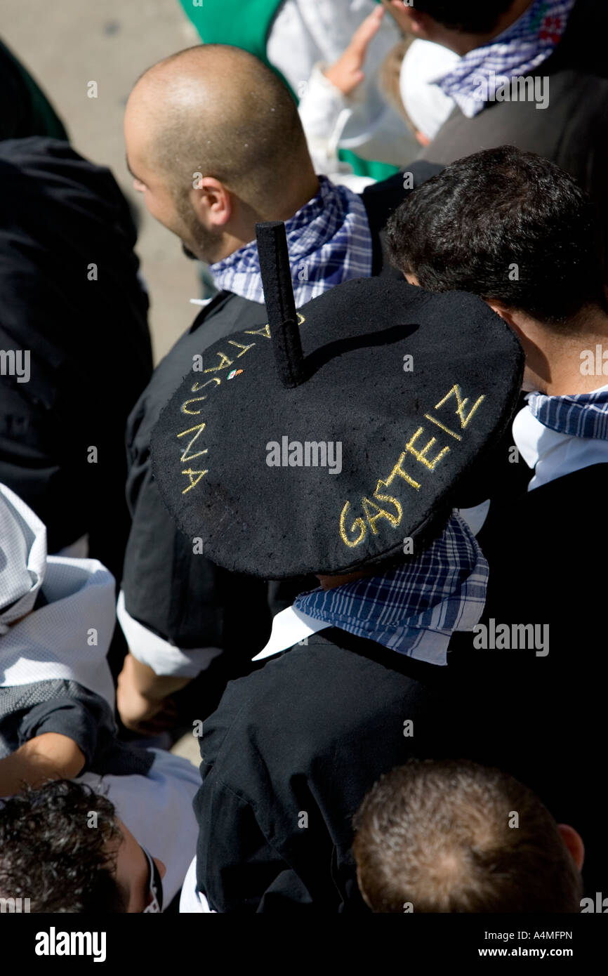 Man wearing oversize black beret with words 'Batazsuna' and 'Gasteiz ...