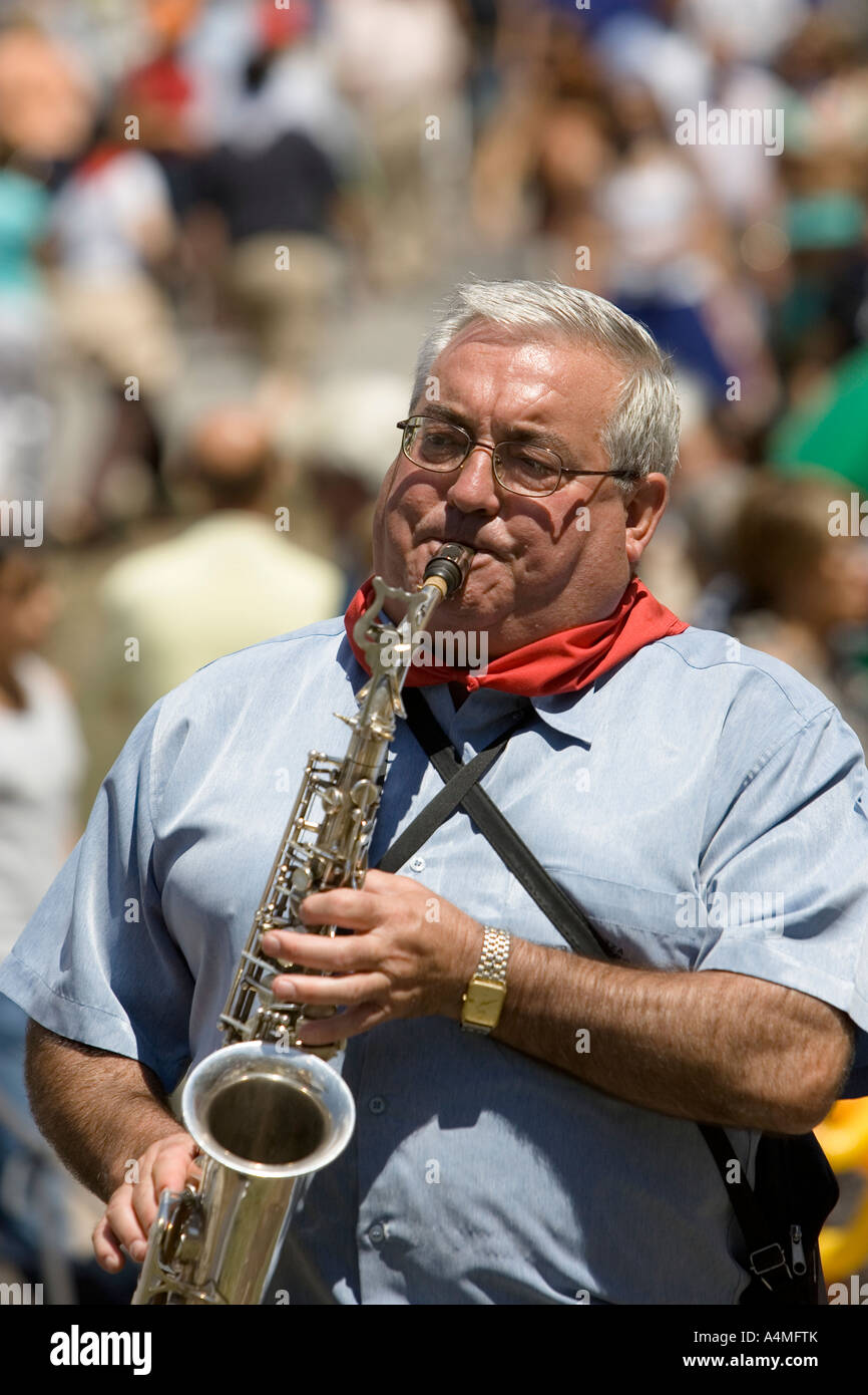 Musician playing saxophone, Plaza de la Virgen Blanca, Fiesta de la ...