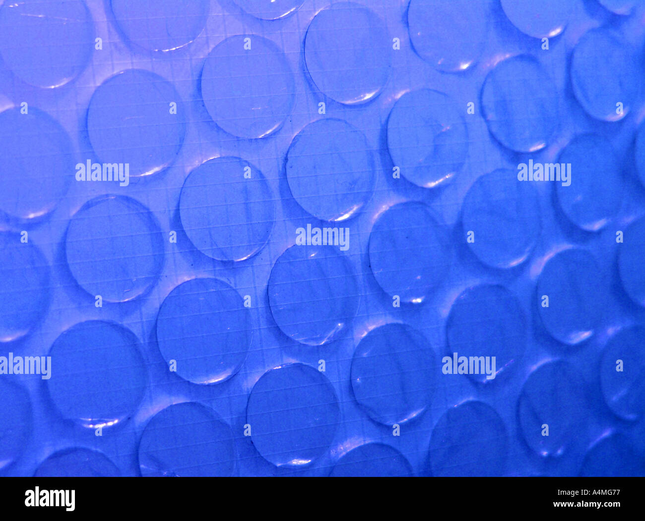 Blue plastic bubble wrap Stock Photo - Alamy