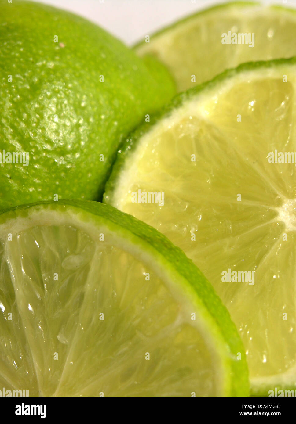 Whole and sliced fresh lime fruit Stock Photo - Alamy
