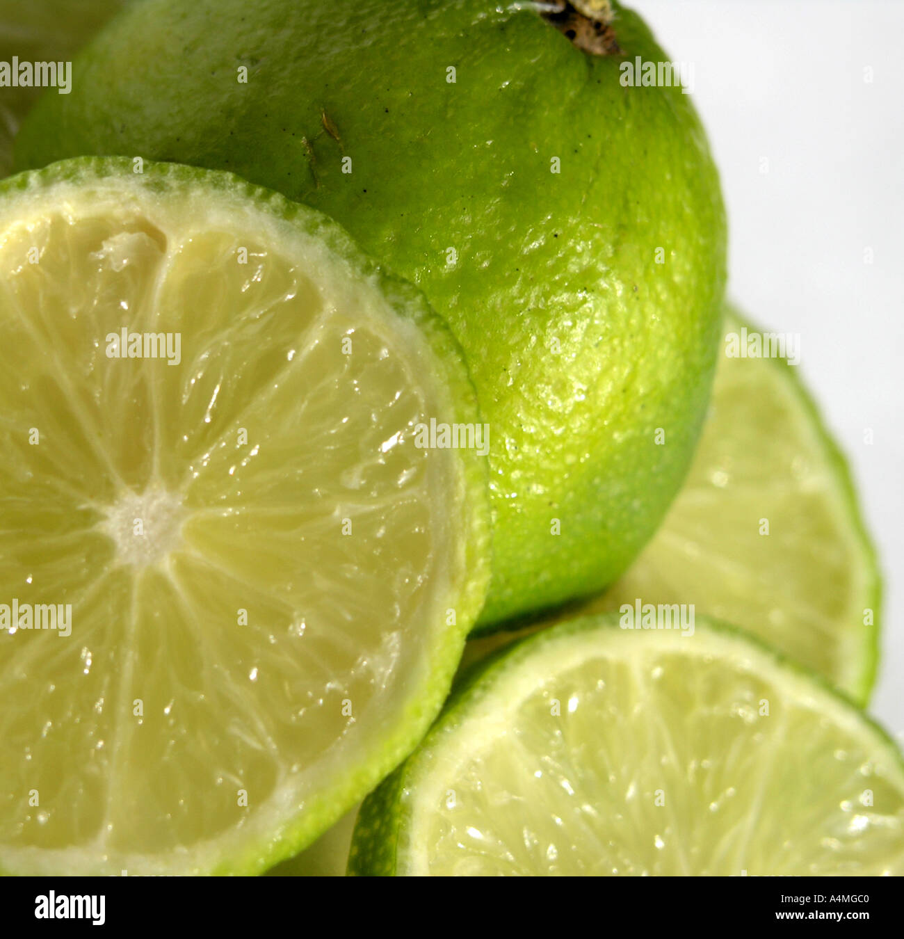 Whole and sliced fresh lime fruit Stock Photo - Alamy
