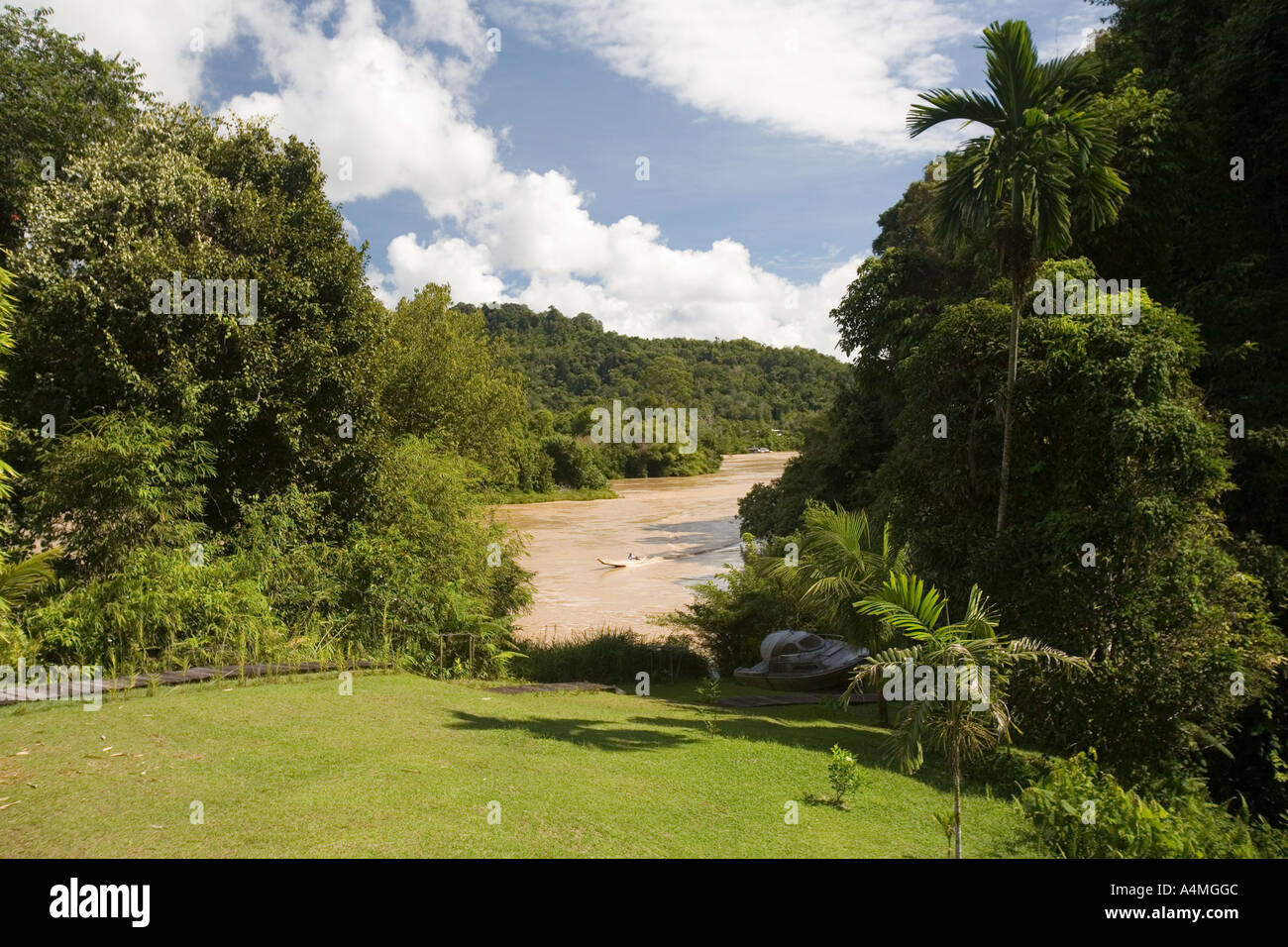 Malaysia Borneo Sarawak Rejang River Pelagus Rapids with longboat going ...