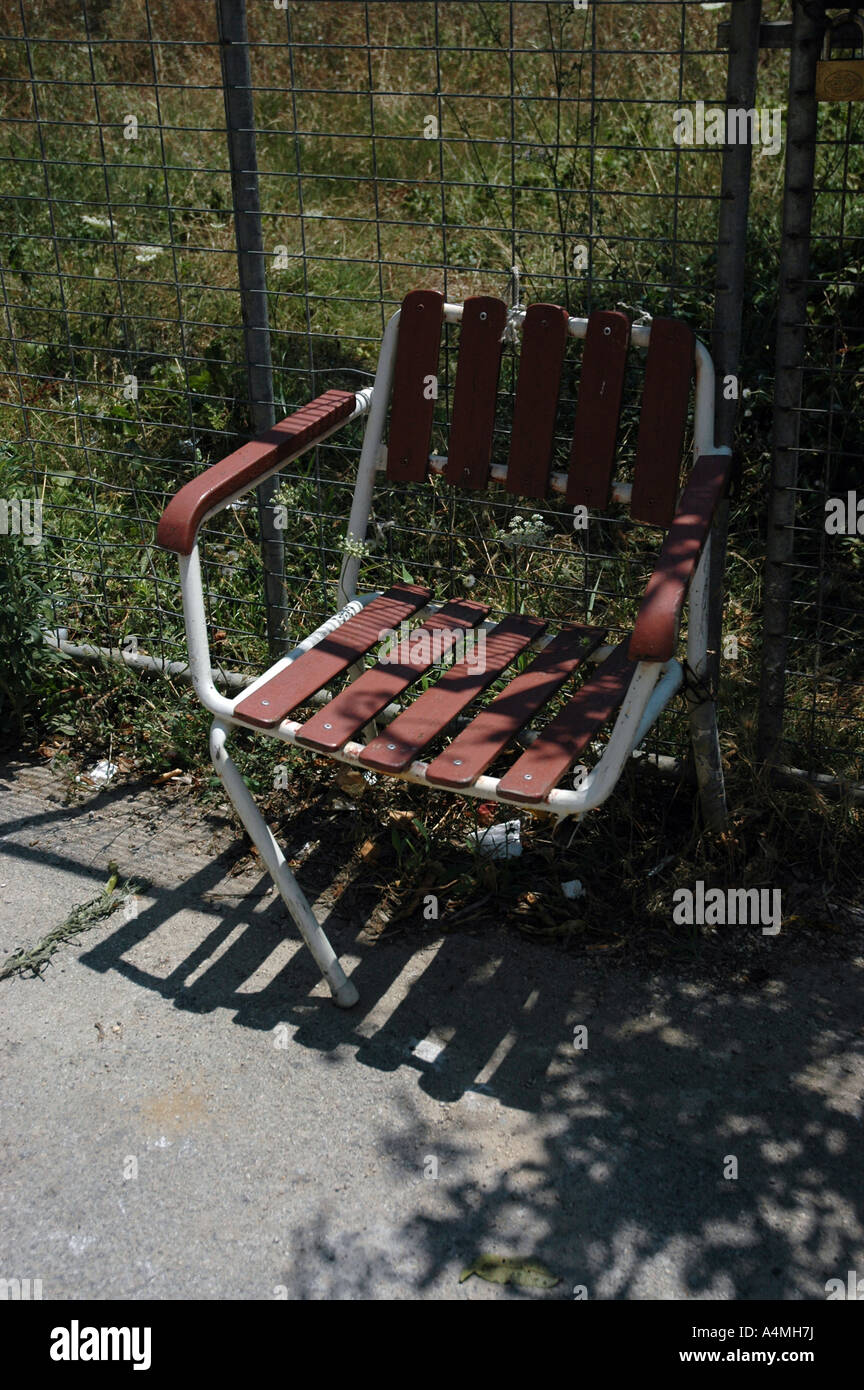old chair on road side in Parga Greece Stock Photo - Alamy
