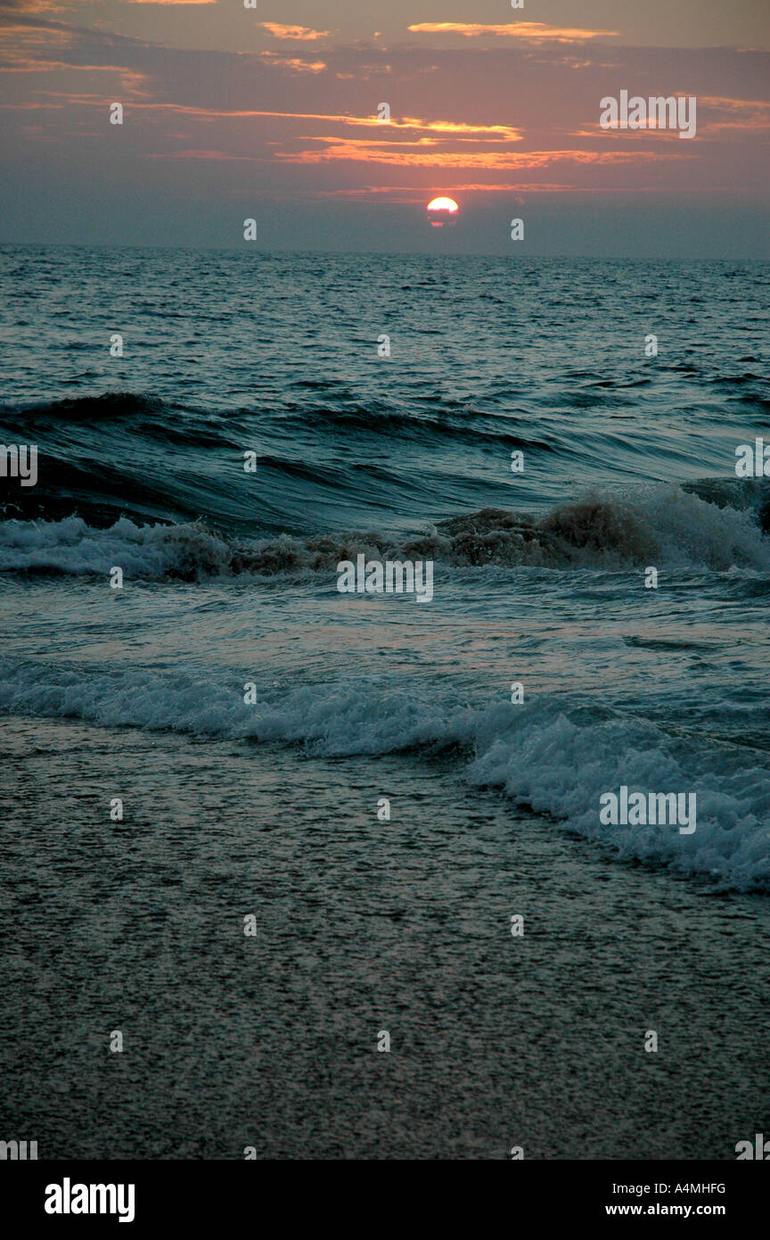 Sunset over ocean and beach in Kerala India Stock Photo - Alamy