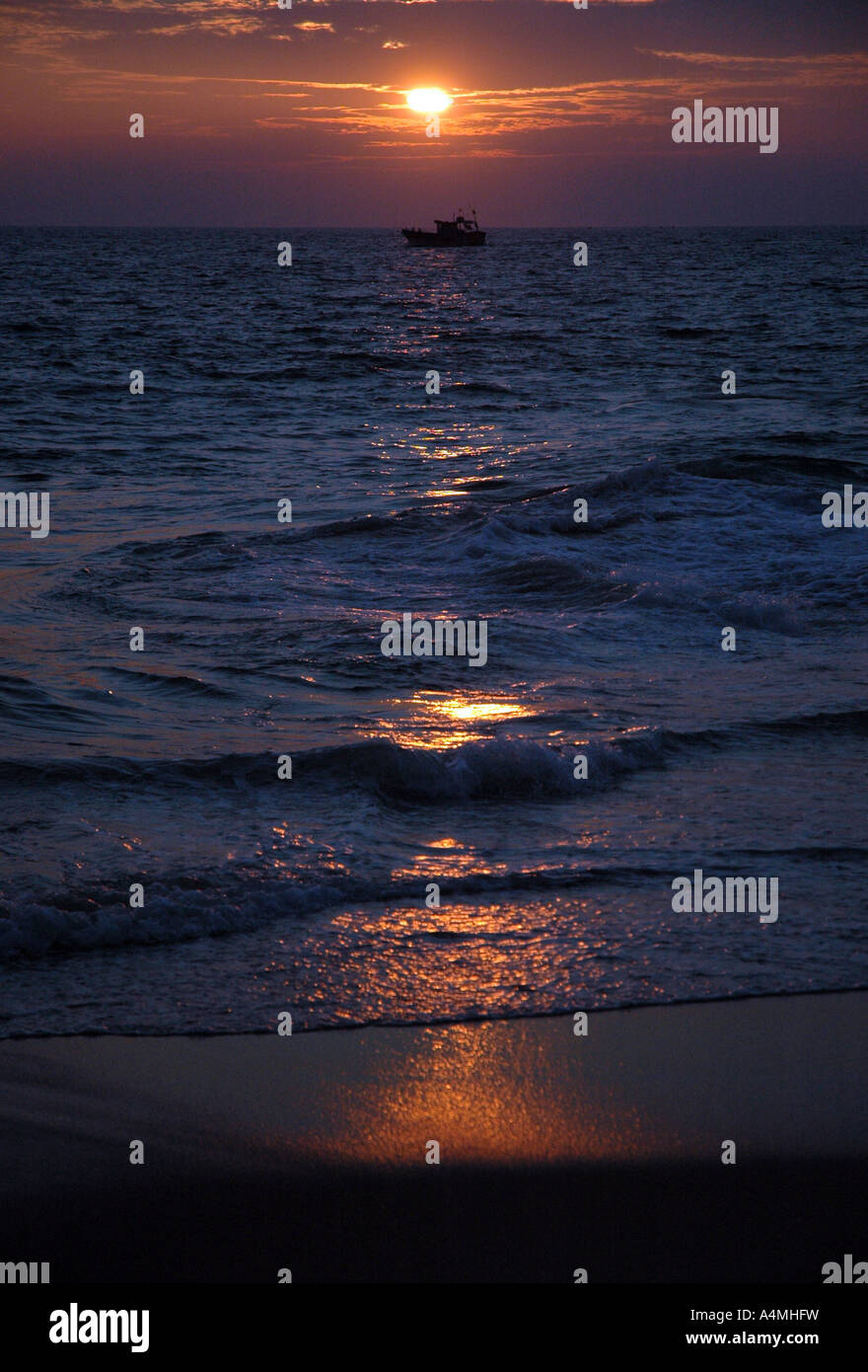 Sunset over sea in Kerala India Stock Photo - Alamy