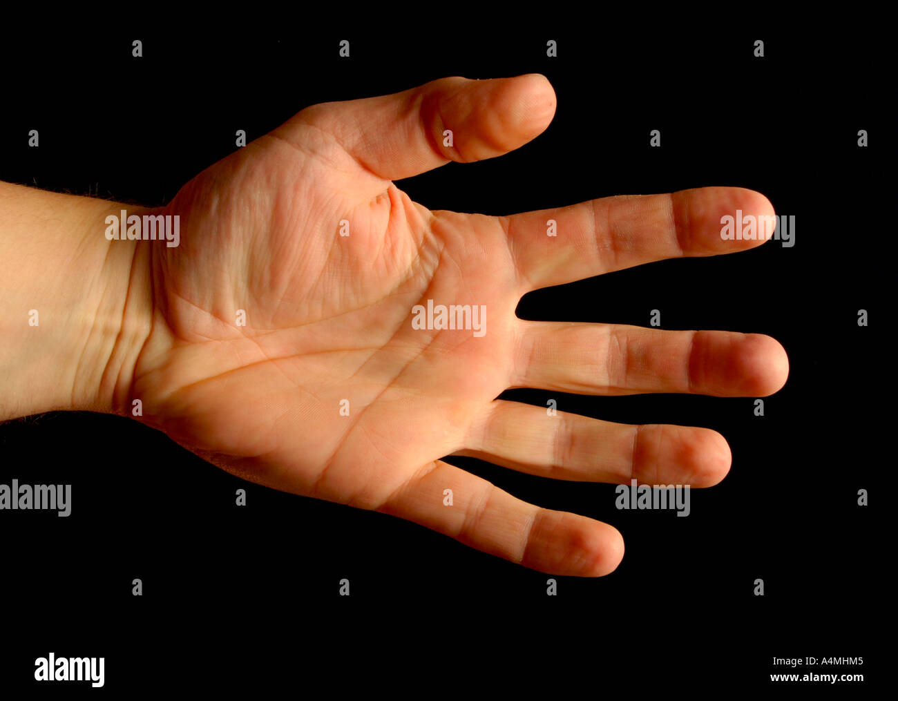 Hand on black background Stock Photo - Alamy