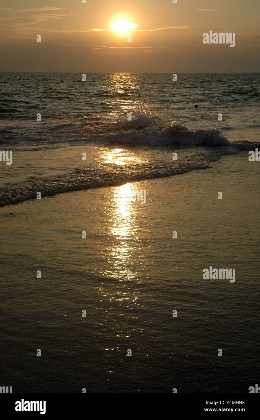 Sunset over ocean and beach in Kerala India Stock Photo - Alamy