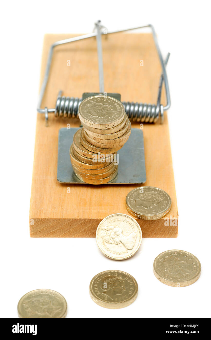 Mousetrap with UK Currency indicating money trap Stock Photo - Alamy