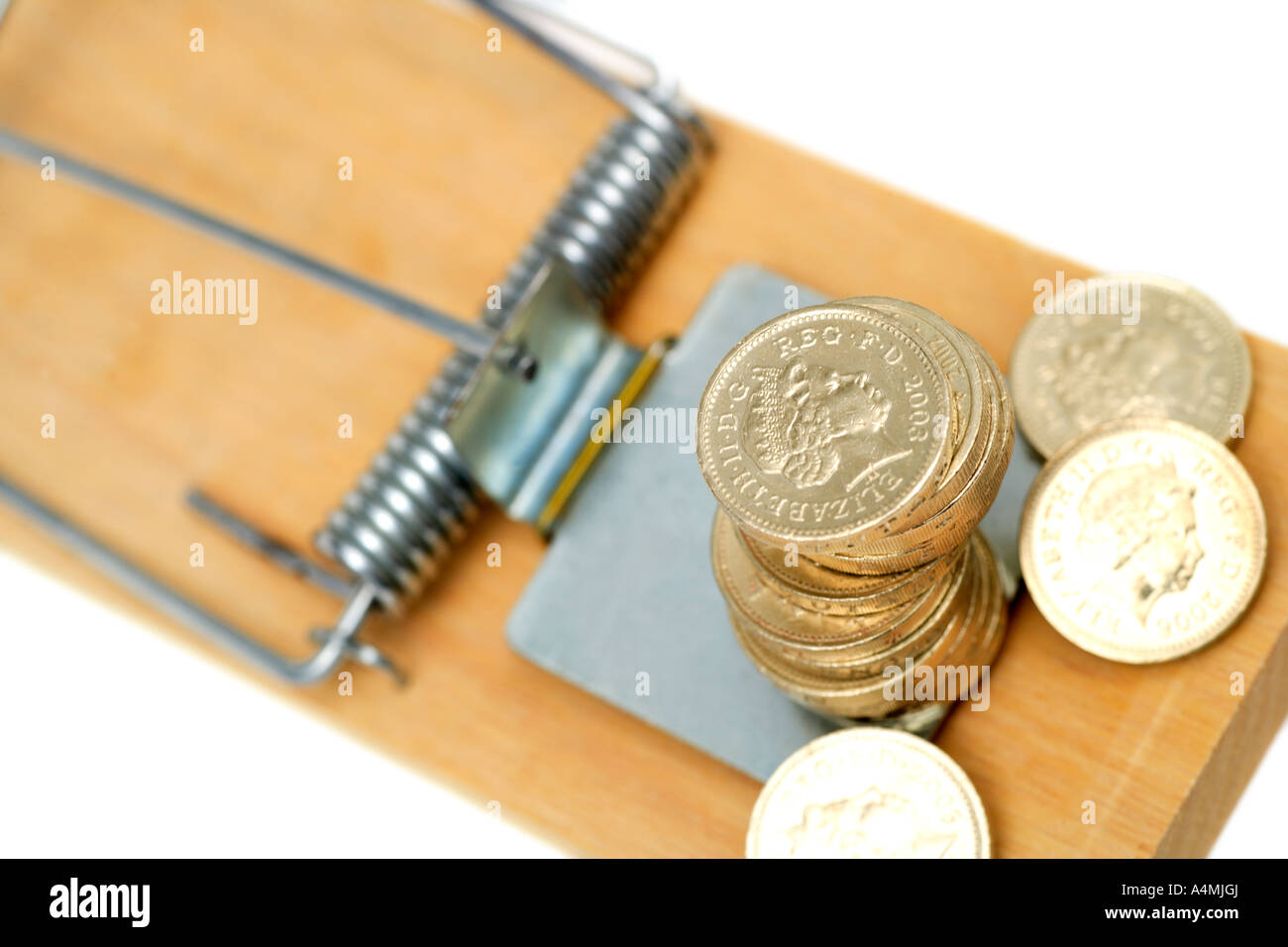 Mousetrap with UK Currency indicating money trap Stock Photo - Alamy
