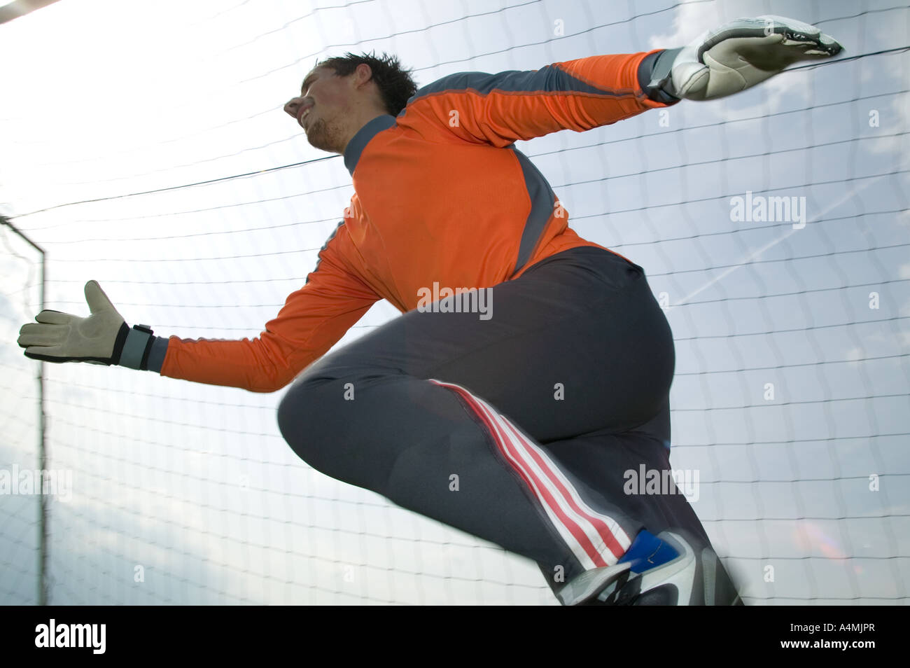 Saving a goal Stock Photo - Alamy