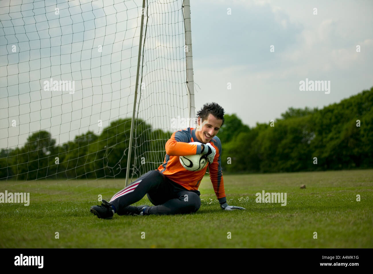 Football goal dive net ball hi-res stock photography and images - Alamy