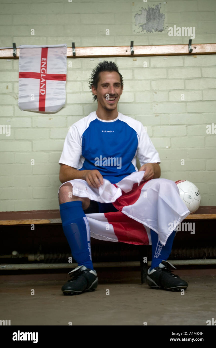 Soccer Player in Locker Room Stock Photo - Alamy