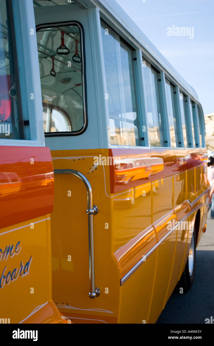 Colorful bus att Valletta bus stainon Stock Photo - Alamy