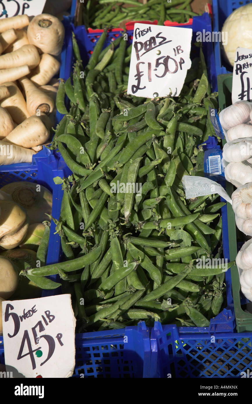 Peas on display for sale on a UK market stall using Imperial ...