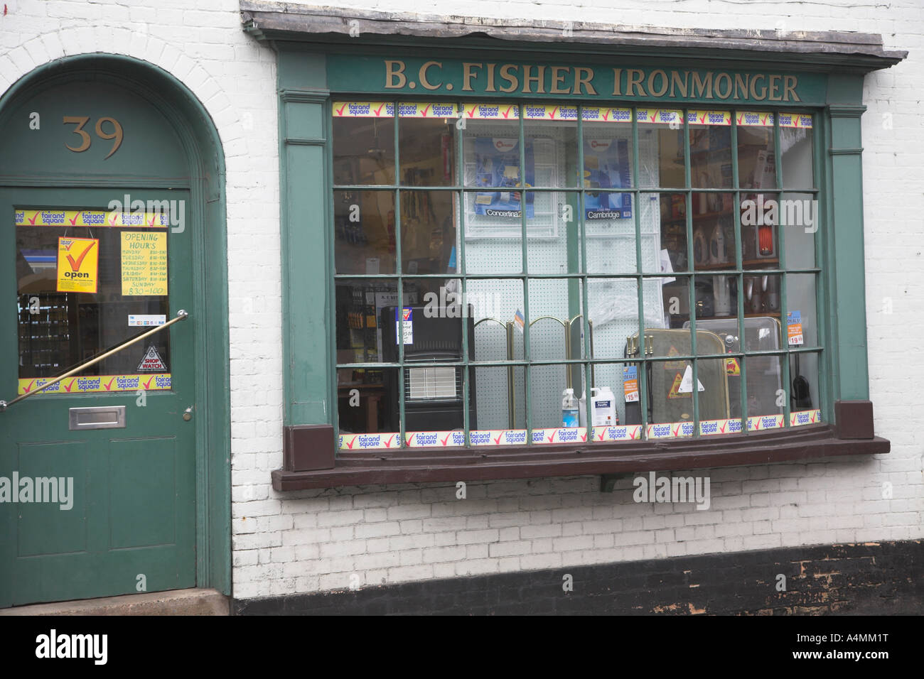 Small bow window shop frontage of specialist Ironmonger shop ...