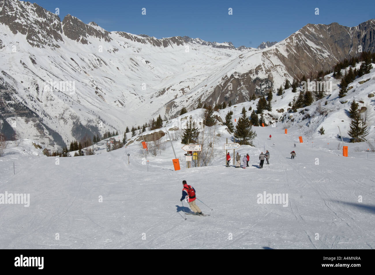 Skiing in Alpe D Huez ski area in the french Alps Stock Photo - Alamy