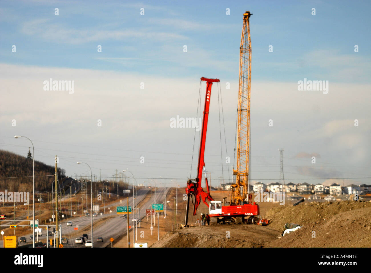 Construction of an overpass at a busy intersection Stock Photo - Alamy