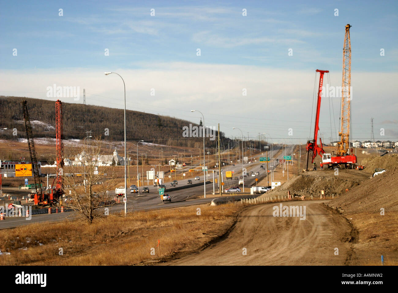 Construction of an overpass at a busy intersection Stock Photo - Alamy