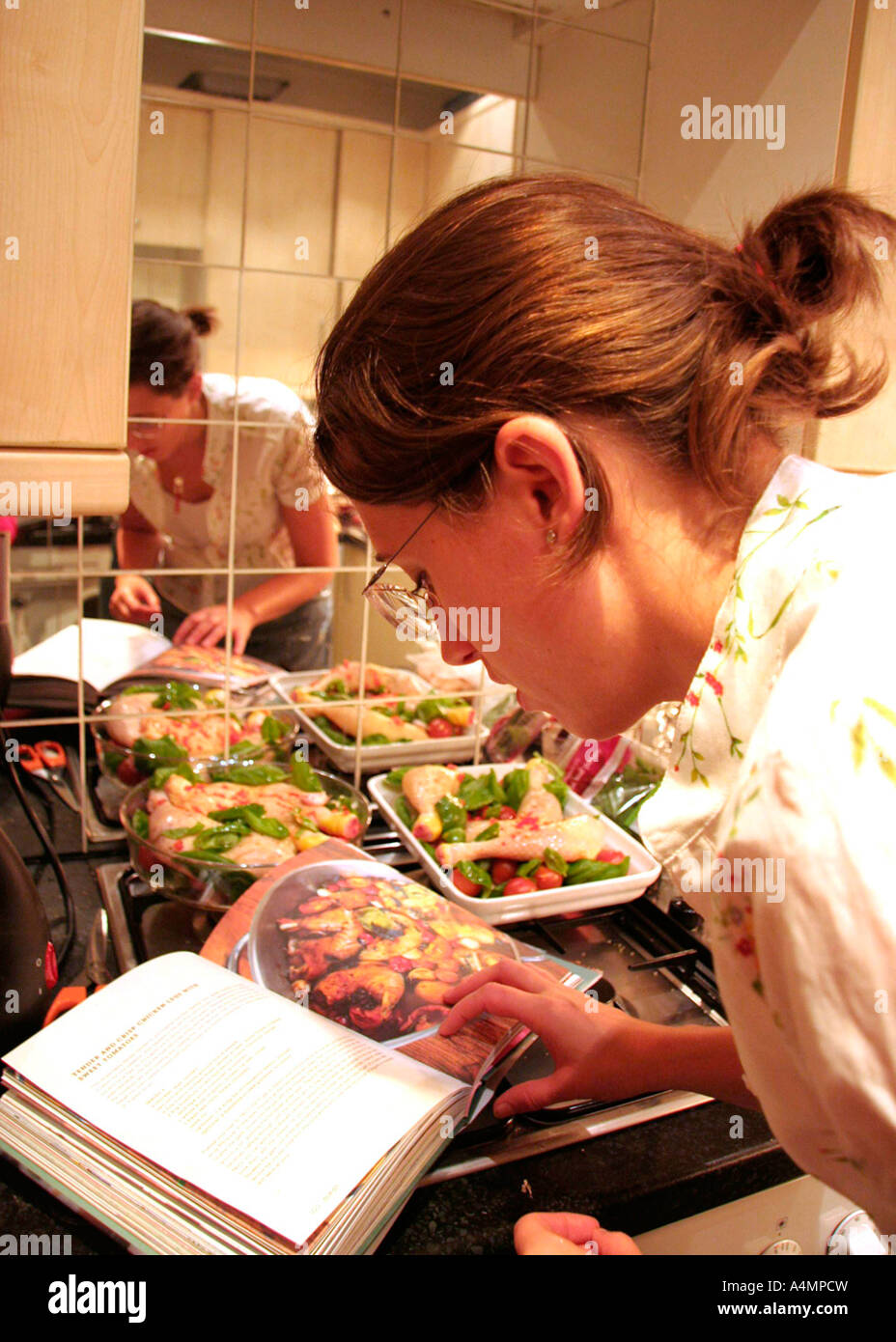 Single cook food preparation reflection chef woman mealtime mea hi-res ...