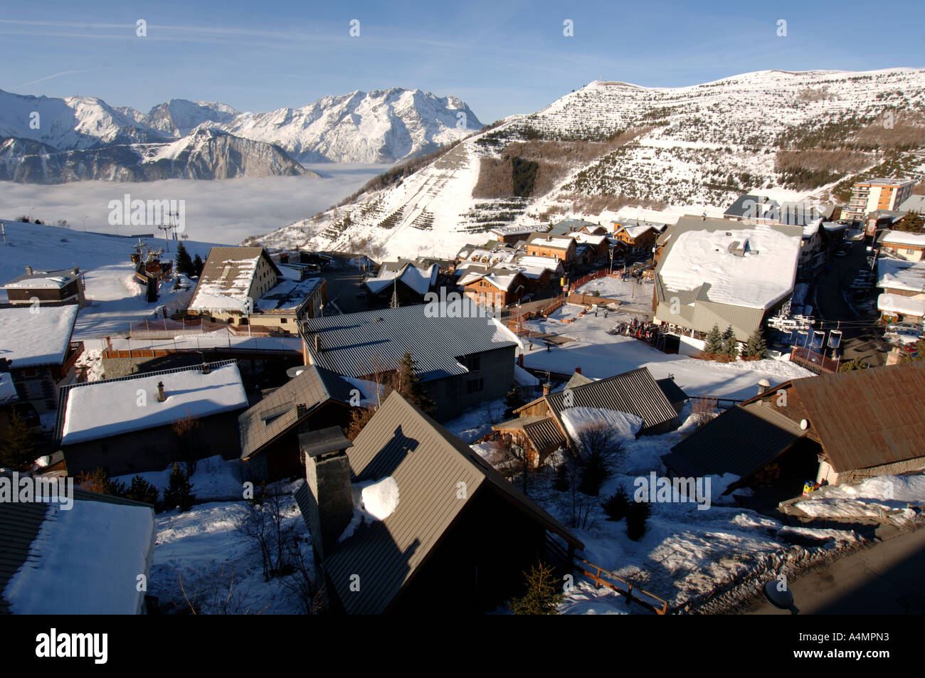 Skiing in Alpe D Huez ski area in the french Alps Stock Photo - Alamy