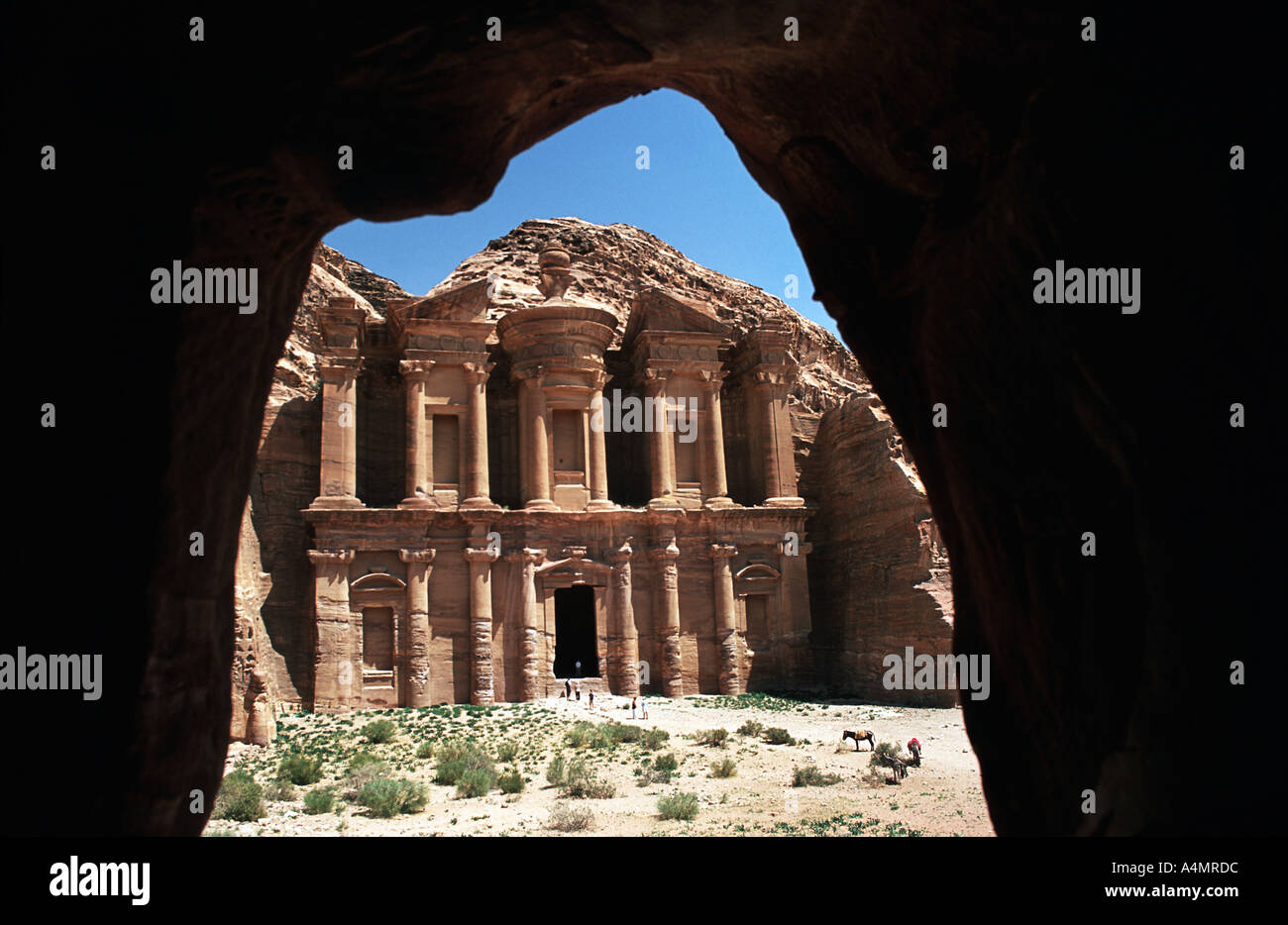 The Monastery Al Deir at the ancient rose red city of Petra framed by ...