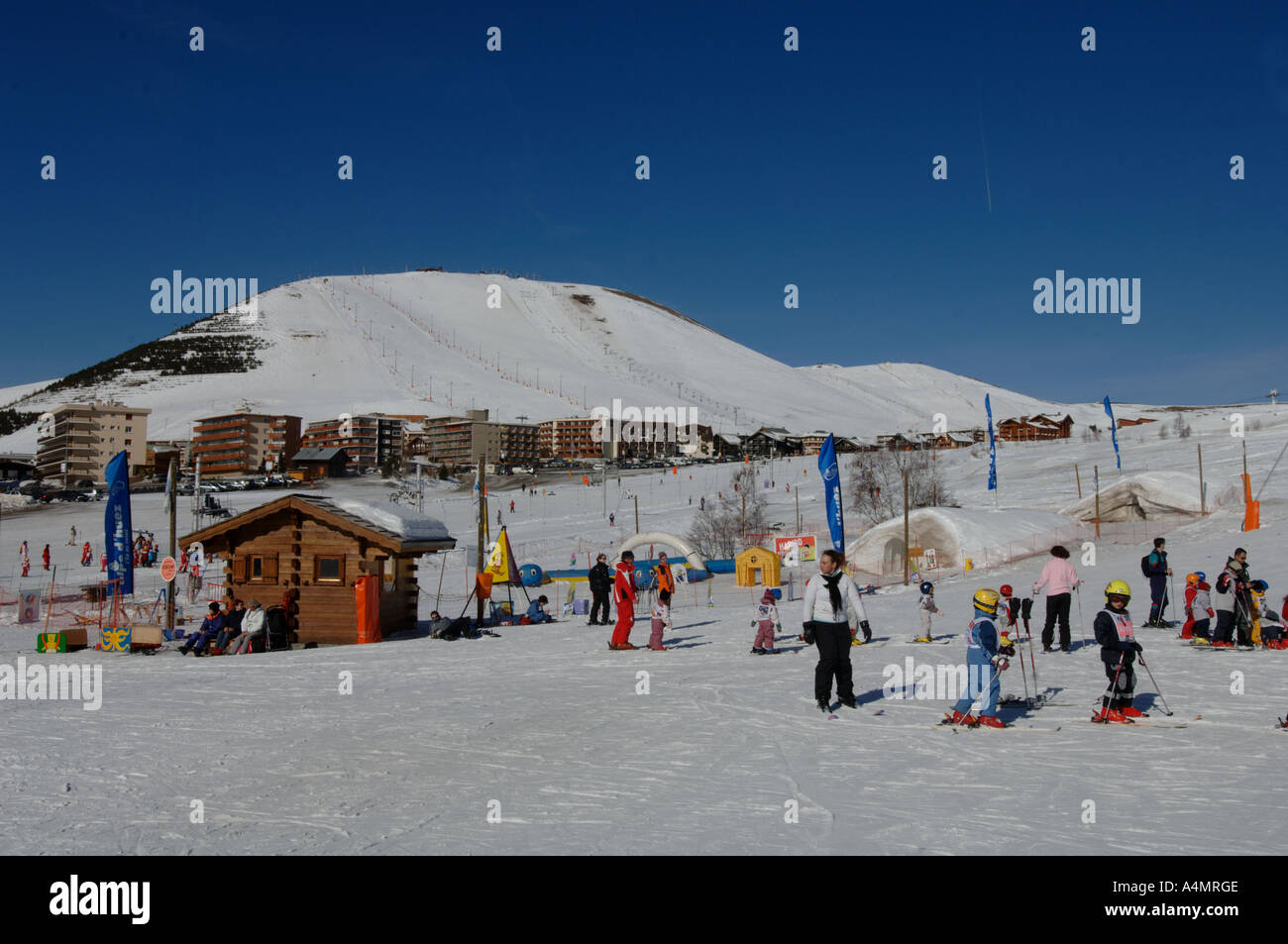 Skiing in Alpe D Huez ski area in the french Alps Stock Photo - Alamy
