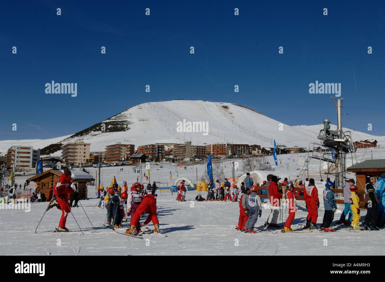 Skiing in Alpe D Huez ski area in the french Alps Stock Photo - Alamy