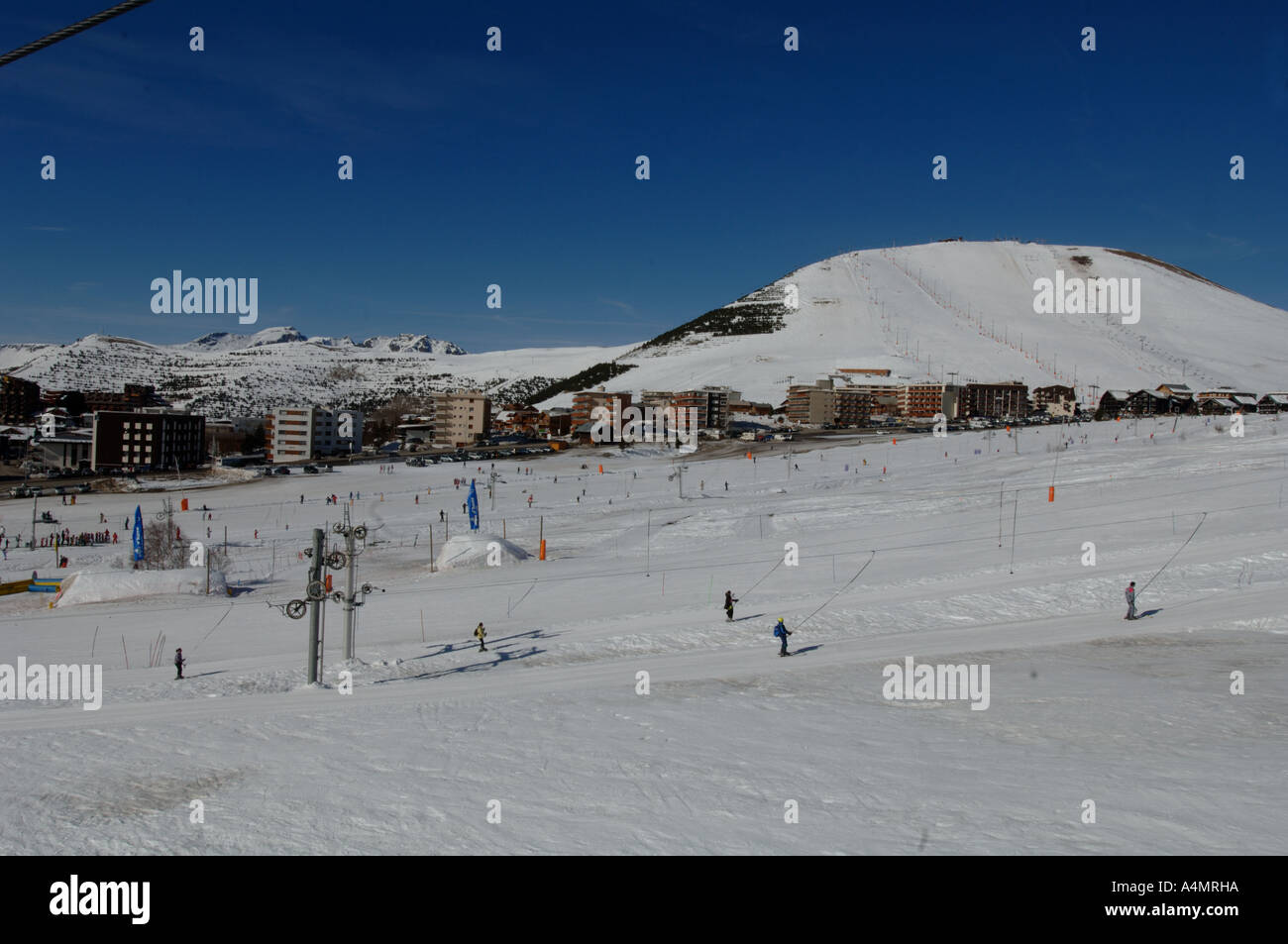 Skiing in Alpe D Huez ski area in the french Alps Stock Photo - Alamy