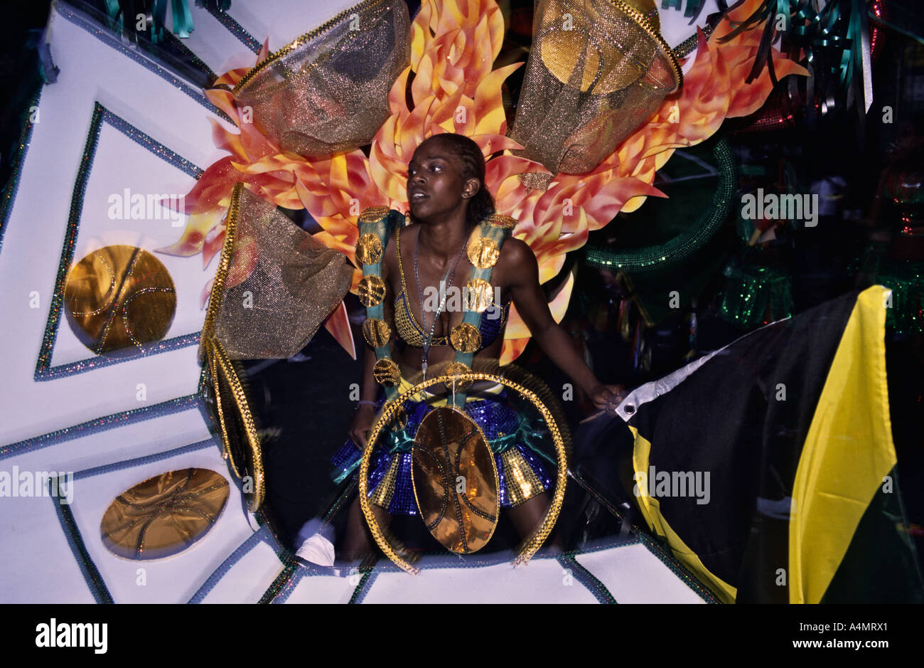London, UK. Costumed dancer at the Notting Hill Carnival, night Stock ...