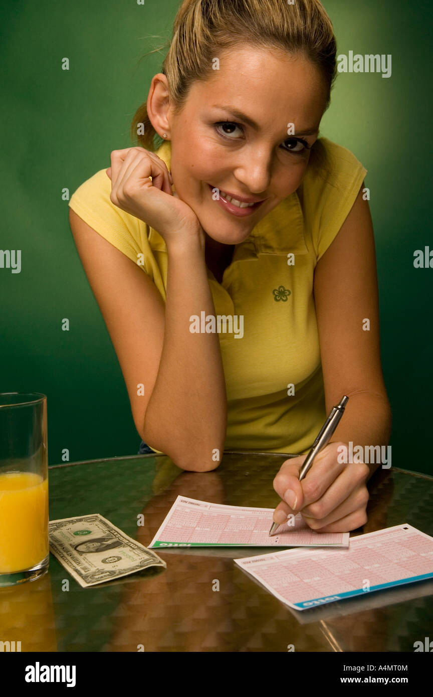 Girl playing the lottery Stock Photo - Alamy