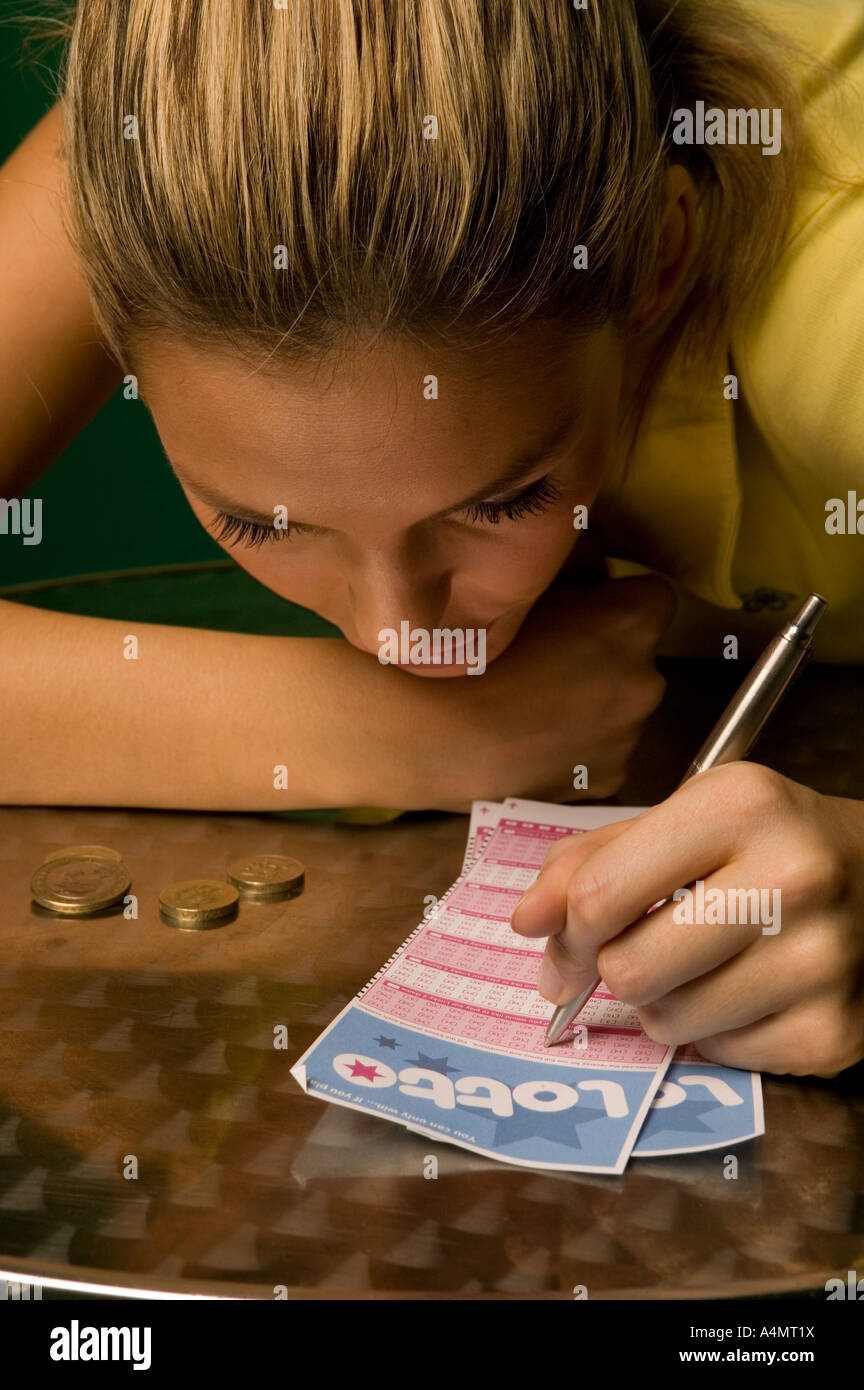 Girl playing the lottery Stock Photo - Alamy