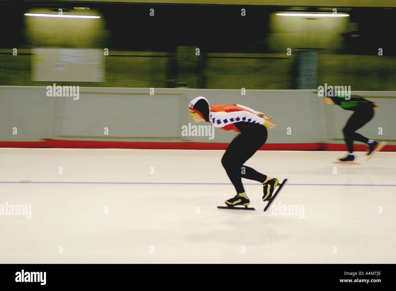 Long track speed skating Stock Photo - Alamy