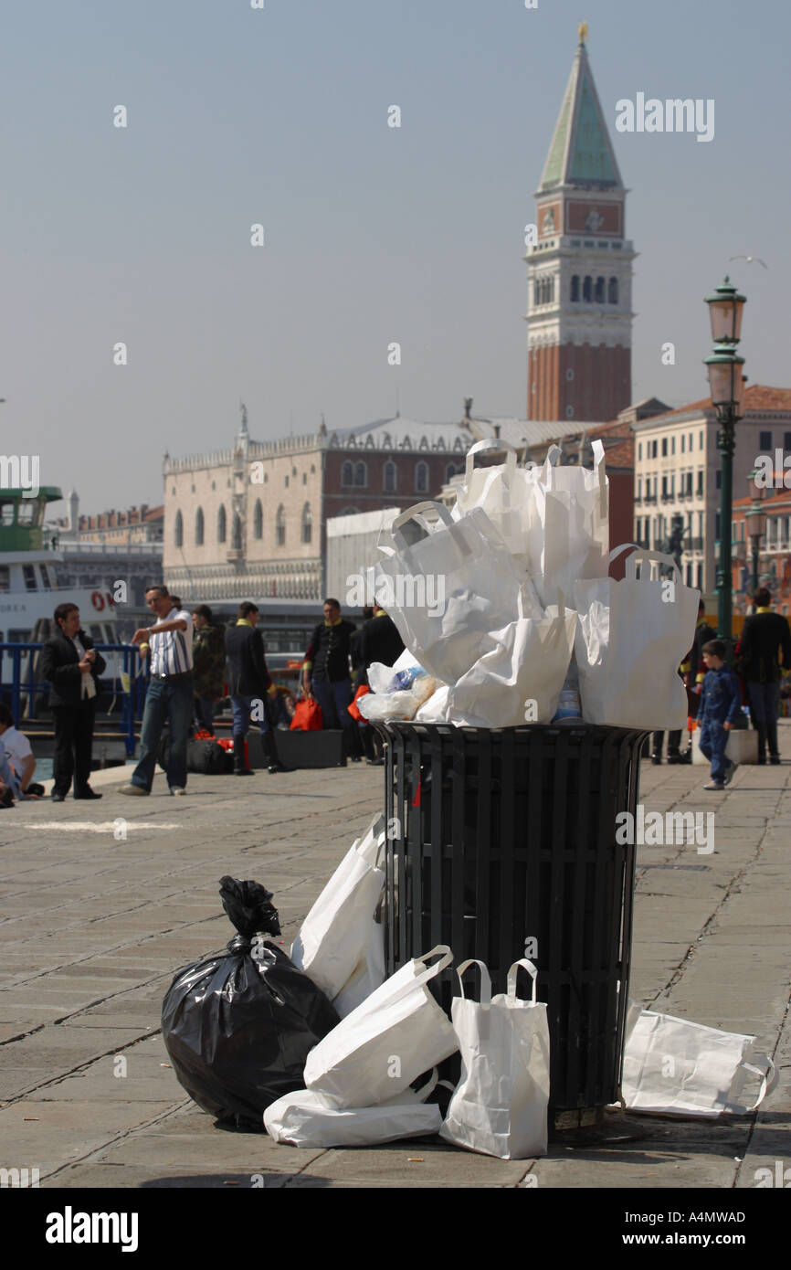 Venice Italy rubbish overflow from public litter bin on waterfront near ...