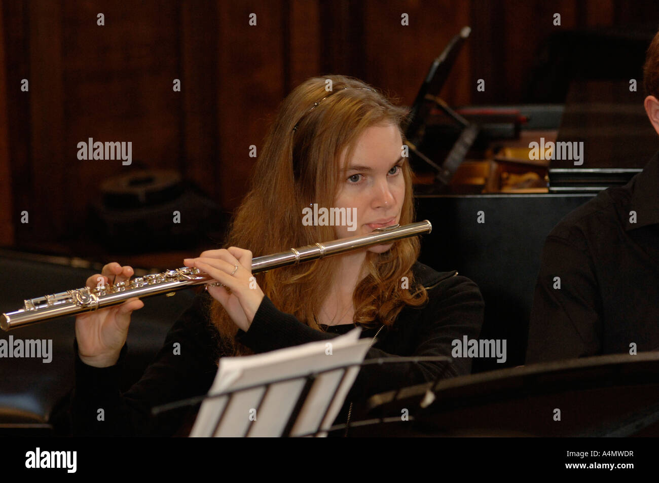 A fluteist playing an original composition Stock Photo - Alamy