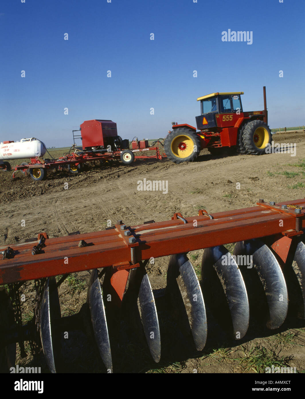 APPLYING DRY FERTILIZER AND ANHYDROUS AMMONIA TOGETHER, ON GROUND PRIOR ...