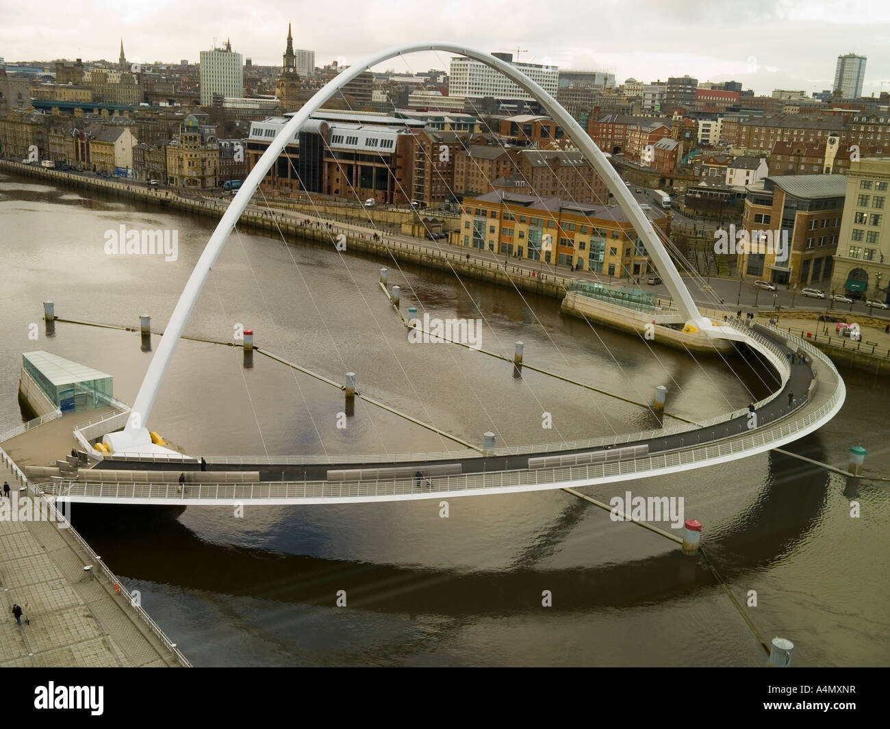 The millennium "winking eye" foot bridge over the river Tyne seen from ...