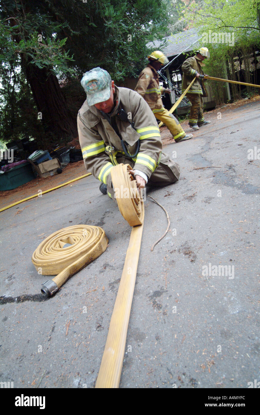 Rolled Up Fire Hose Stock Photos & Rolled Up Fire Hose Stock Images - Alamy
