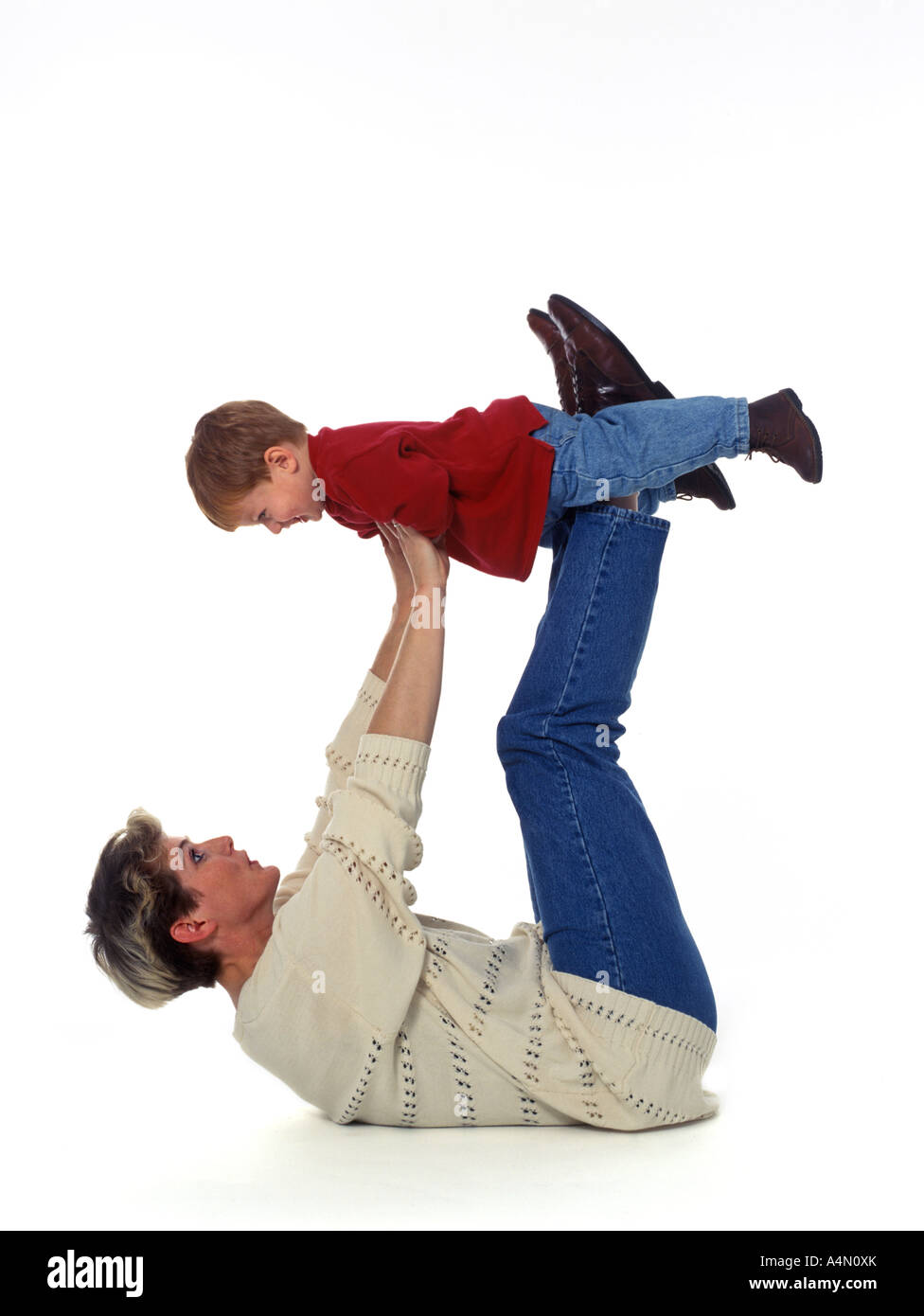 Kid boy mother play Cut Out Stock Images & Pictures - Alamy