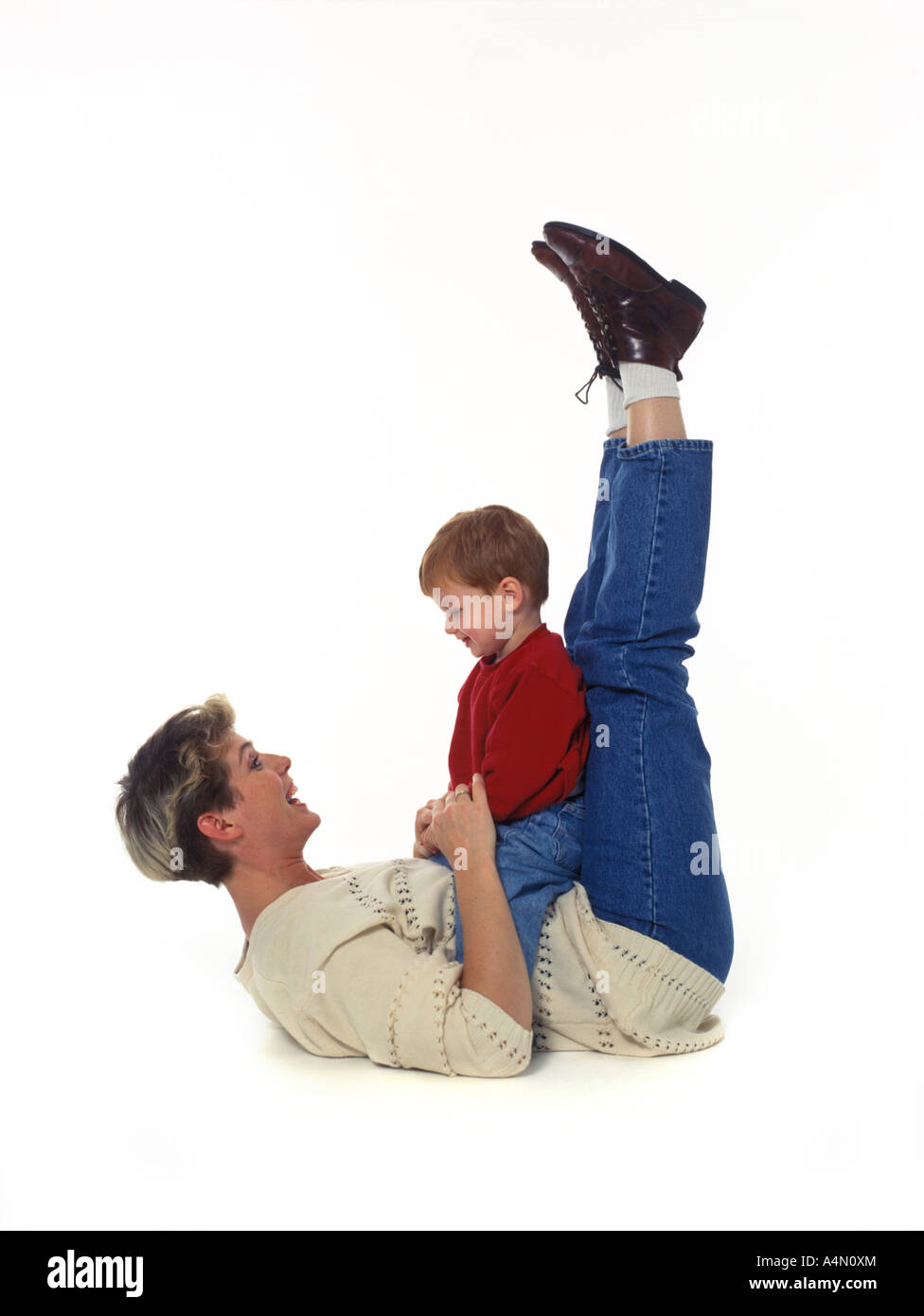 Kid boy mother play Cut Out Stock Images & Pictures - Alamy