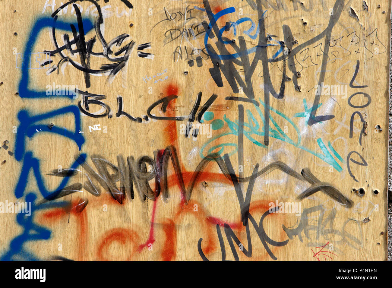 various grafitti writing on wooden panel Tenerife Canary Islands Spain ...