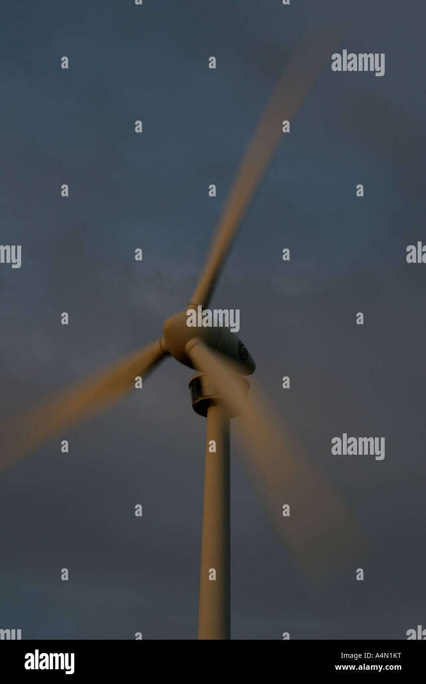 Turning wind turbine at dusk. Swaffham. Norfolk, UK. Portrait. Vertical ...