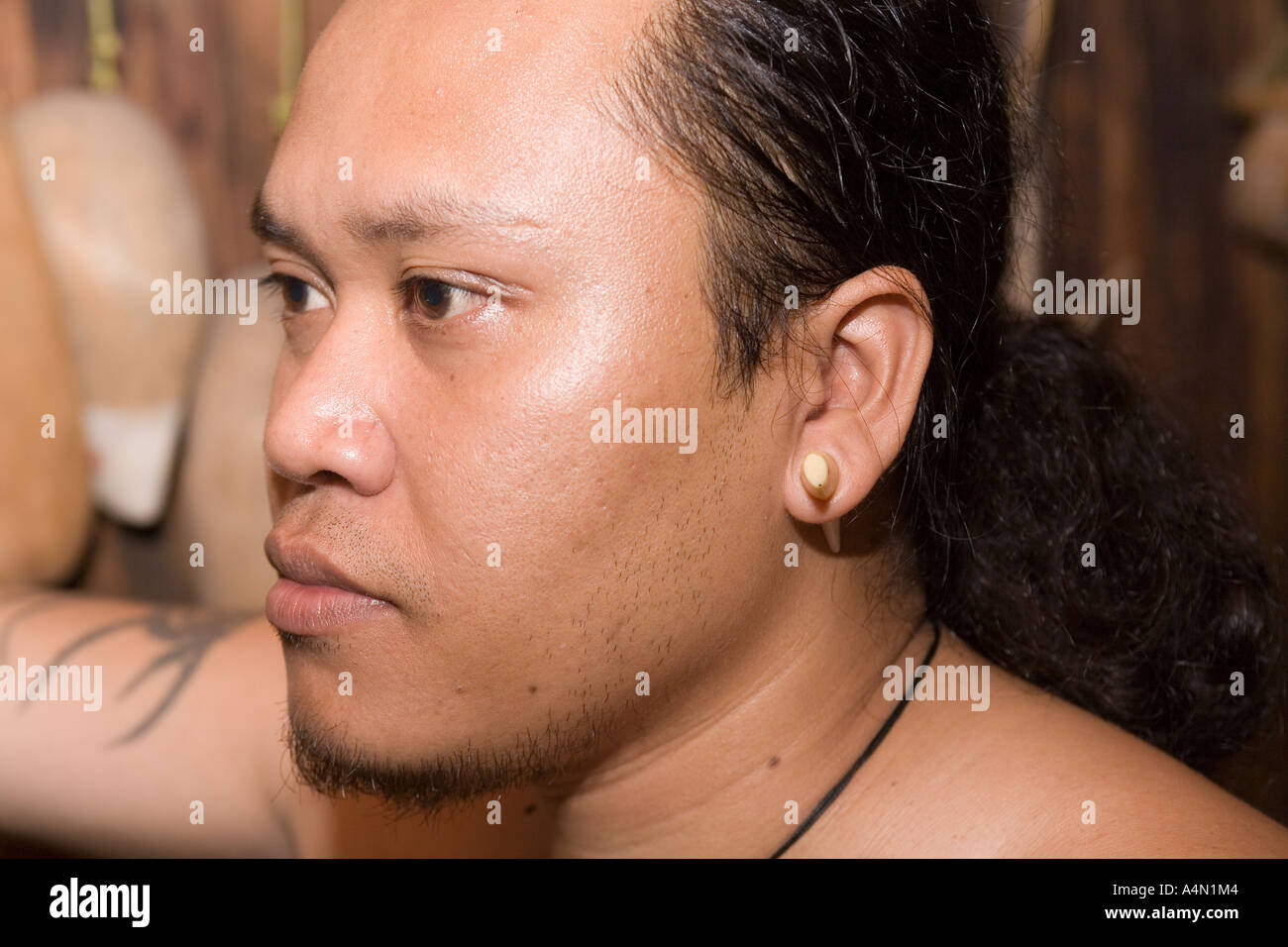Malaysia Borneo Sarawak Cultural Village Iban man showing pierced ear ...