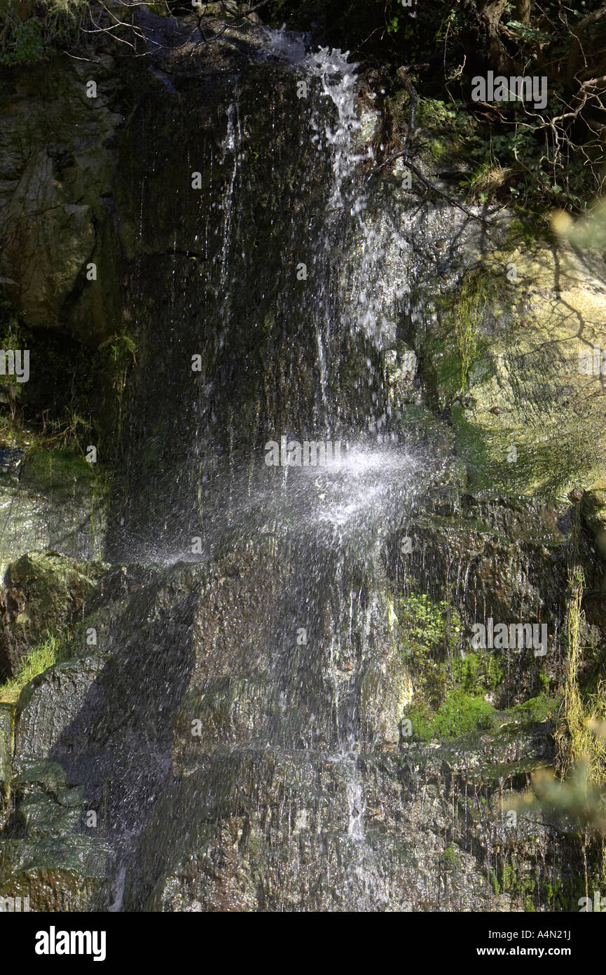 vertical water falling cascading and splashing onto rocks in Carnlough ...