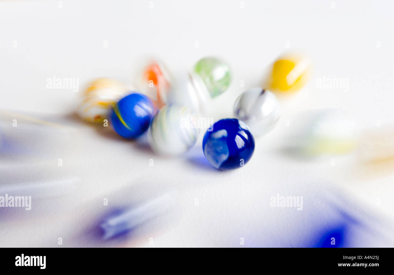 Glass marbles scattering in all directions Stock Photo - Alamy