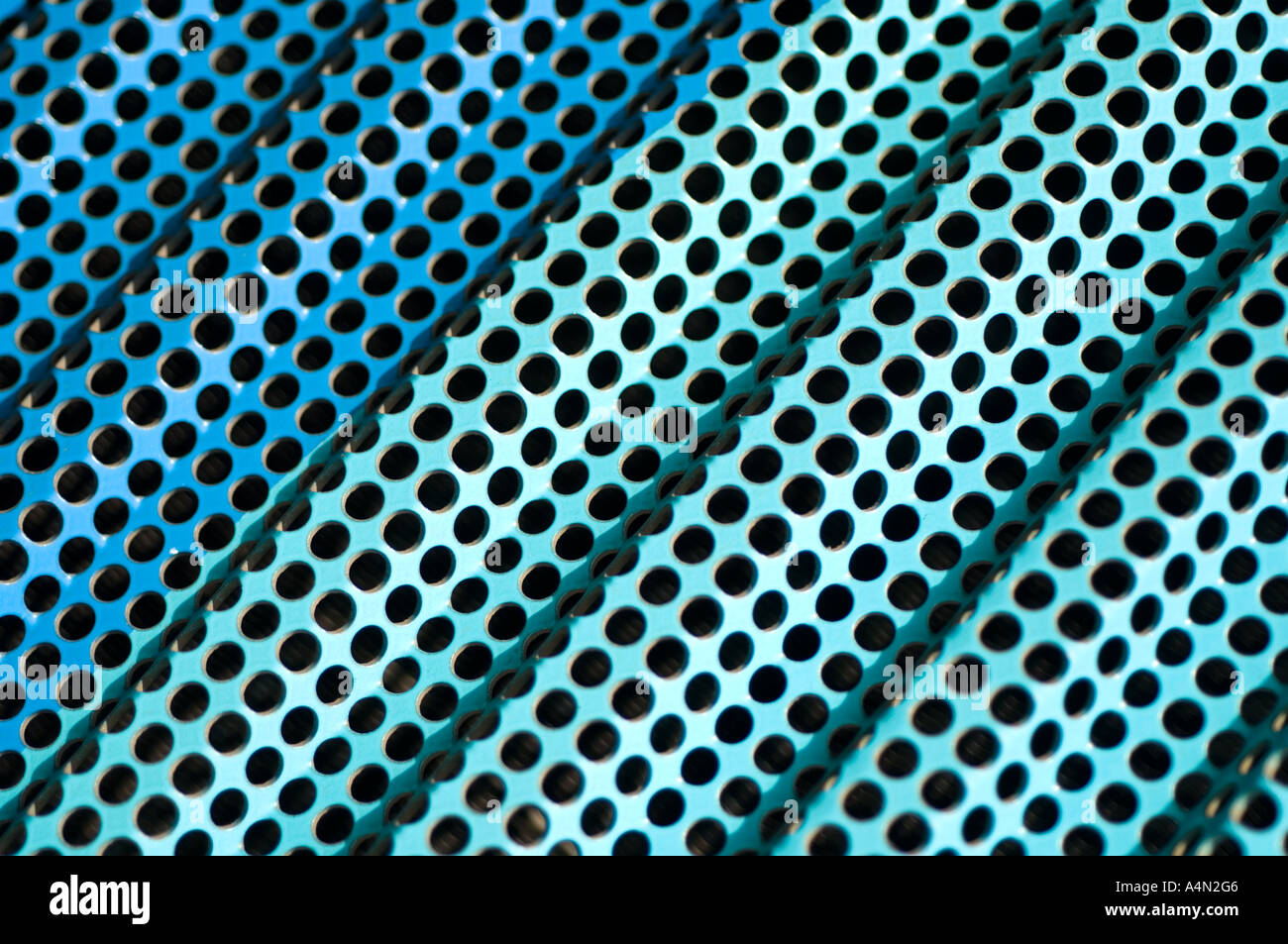 Blue perforated metal texture hi-res stock photography and images - Alamy