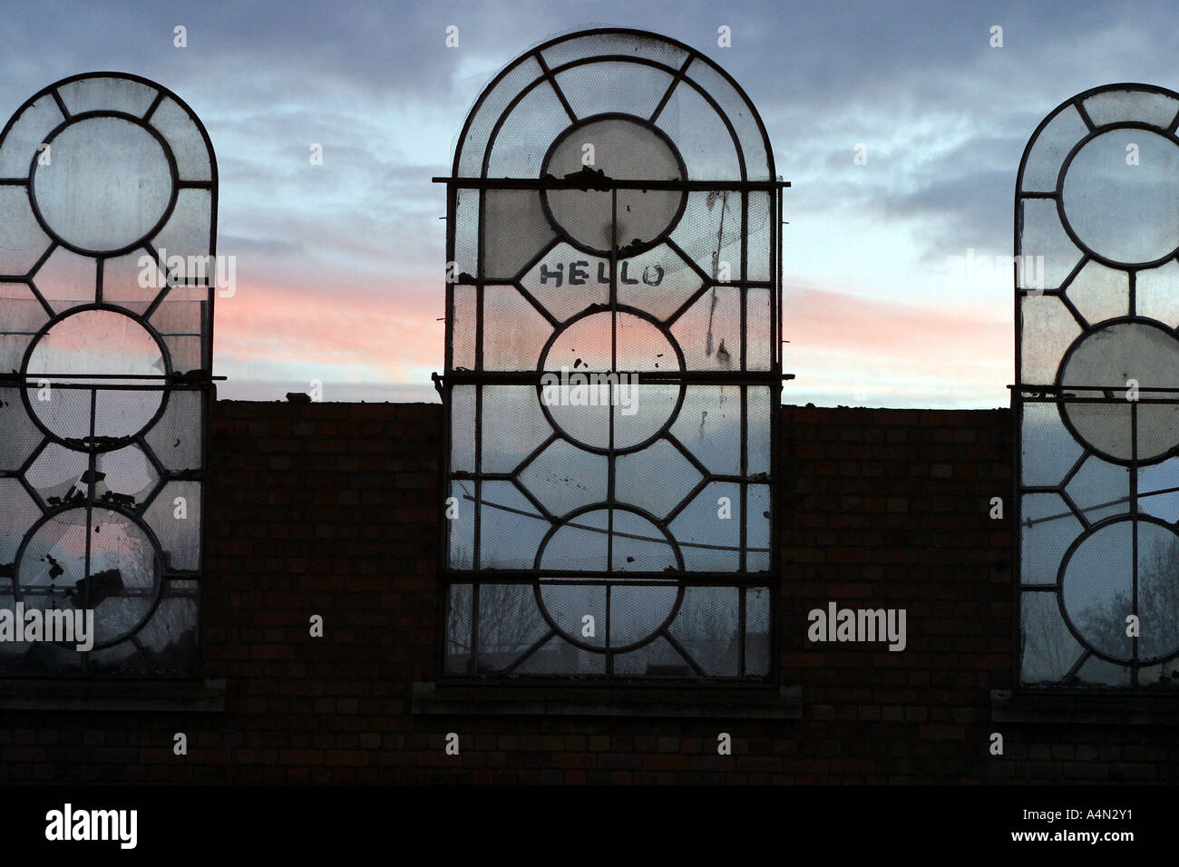 three old oval windows left intact in a demolished building,s outer ...